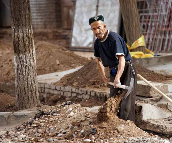 Photo, Image & Picture of Uyghur People Working